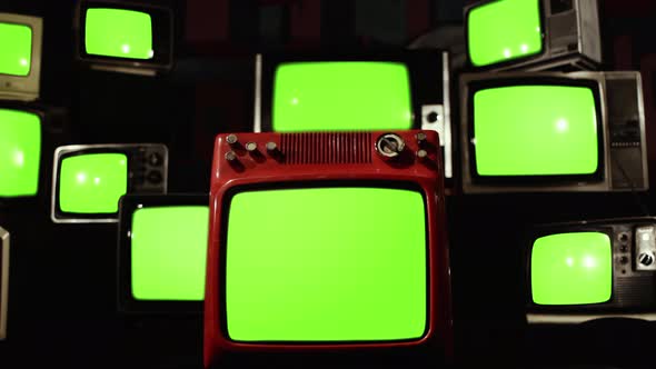 Pile of Retro TVs turning on Green Screens with Color Bars. Zoom Into ...