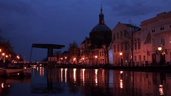 Time-lapse day to night in Leiden with moving bridge and lights in the ...