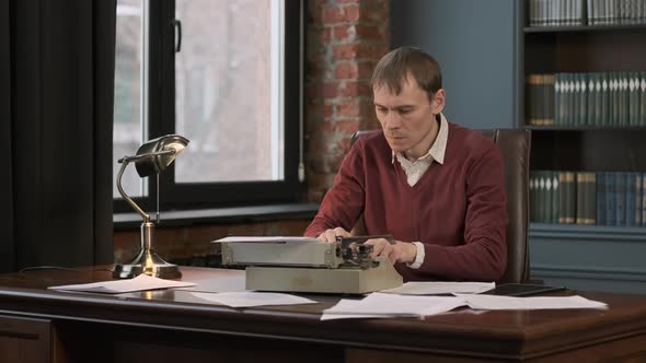 Male Writer Working on a Novel on a Typewriter, Stock Footage | VideoHive