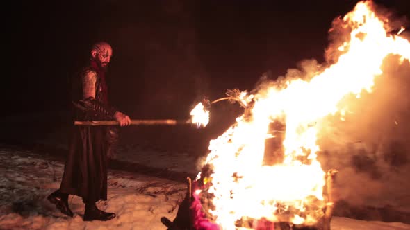 Viking with a Torch Lights Bonfire, Stock Footage | VideoHive