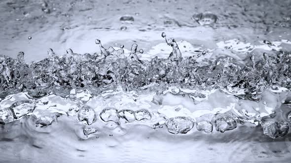 Super Slow Motion Shot of Crashing Two Water Waves and Making Linear ...