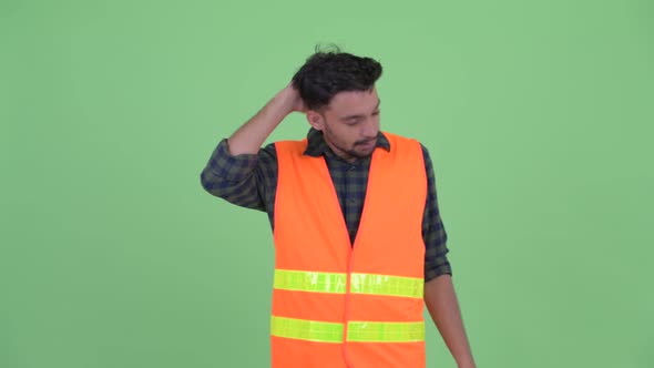 Confused Young Bearded Persian Man Construction Worker Scratching Head ...