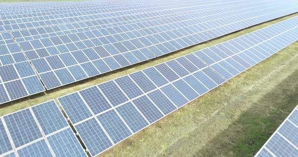 4K Aerial footage of photostatic solar farm. Solar farm power station ...