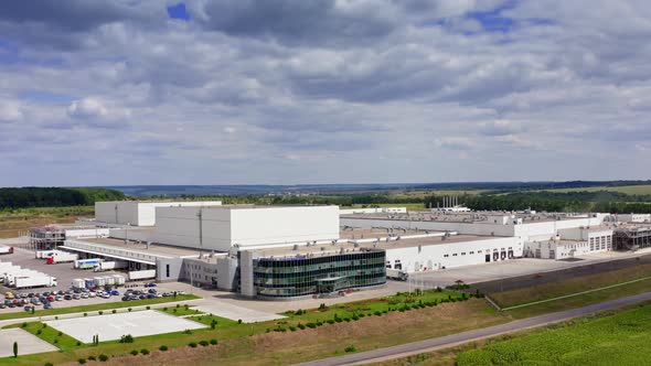 Aerial view of suburb industrial area with group of modern warehouses ...