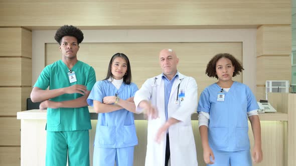 A medical professor gives advice on patient examinations to medical ...