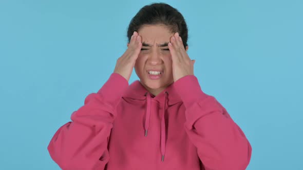 Indian Girl Having Headache Blue Background, Stock Footage | VideoHive