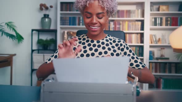 Funny Video of Smiling African Woman Frantically Typing Text on Retro ...