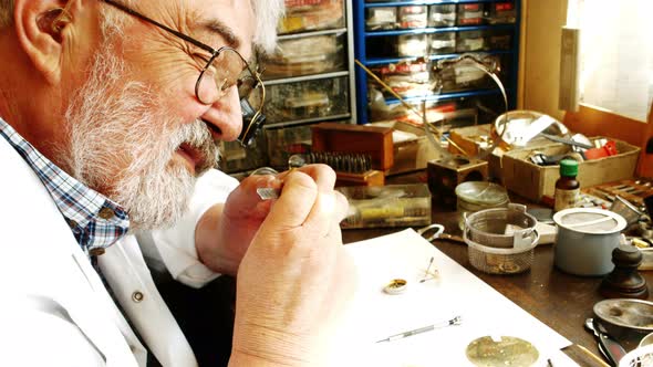 Horologist repairing a watch, Stock Footage | VideoHive