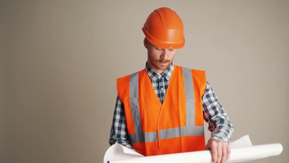 Serious builder looks at the project, Stock Footage | VideoHive
