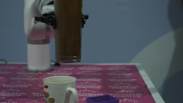 Closeup of Robotic Hand Pouring Drink, Stock Footage | VideoHive