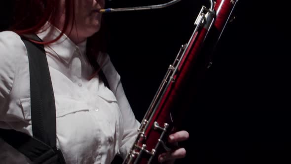 Woman Play the Bassoon Instrument Closeup, Stock Footage | VideoHive