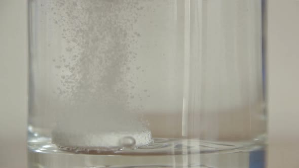Effervescent Soluble Tablet Dropped Glass Dissolving With Sound, Stock ...