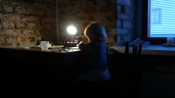 Lefty Little Girl Sits Near The Window And Painting. Baby Is Painting ...