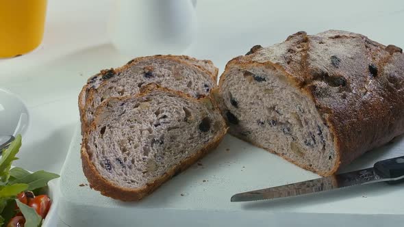 Closeup of Sliced Rye Raisin Bread on the White Cutting Board, Stock ...