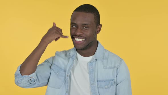 Call Me Sign By Middle Aged Businessman Yellow Background, Stock Footage