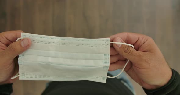 Man Holding A Mask In Hand, Stock Footage | VideoHive