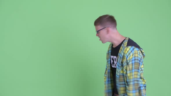 Portrait of Stressed Nerd Man Showing To Back and Getting Bad News ...