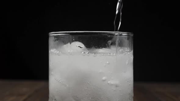 Sprite or water poured into glass, Stock Footage | VideoHive
