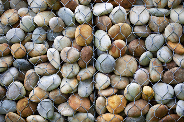 Decorative collection of pebbles in a park Stock Photo by Redzen2 ...