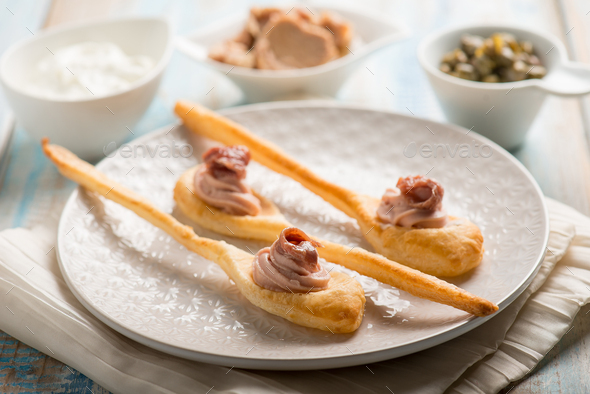 spoon canapes with tuna cream anchovies and capers Stock Photo by ...
