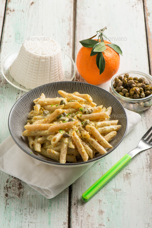 pasta with ricotta cheese capers and grated orange peel Stock Photo by ...