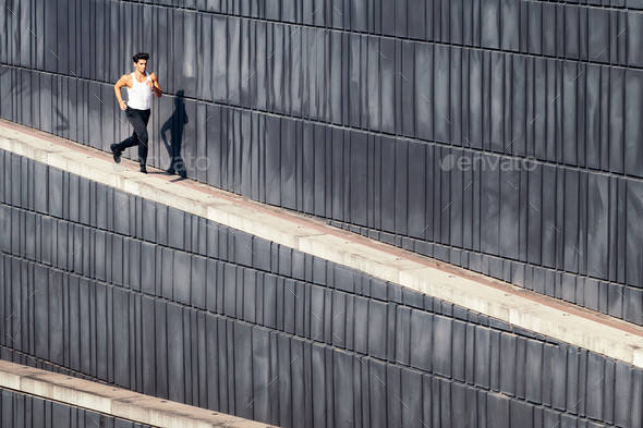 sportsman running down a ramp during his training Stock Photo by Raul ...