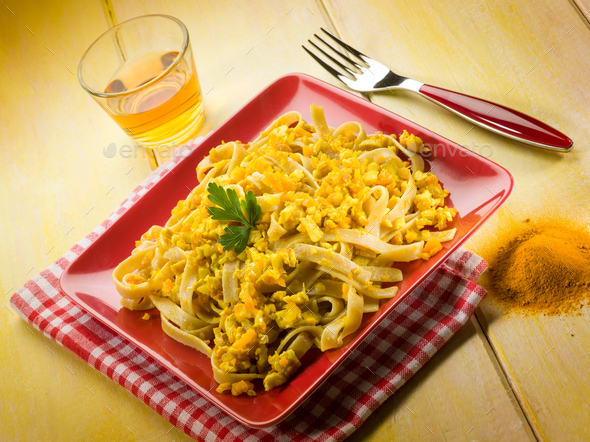 pasta with chicken ragout and curry Stock Photo by MarcoMayer | PhotoDune