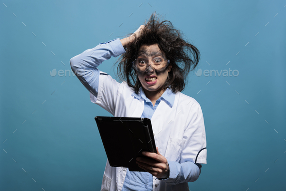 Crazy scientist angrily pulling messy hair after failed chemical ...