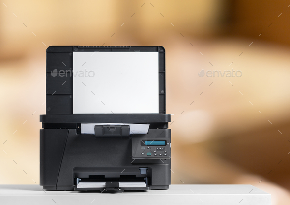 Printer, copier, scanner. Office table Stock Photo by FabrikaPhoto