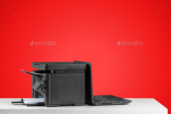 Printer, copier, scanner. Office table Stock Photo by FabrikaPhoto