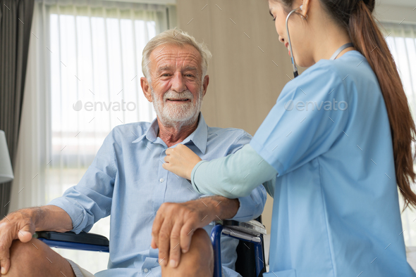 Nurse using stethoscope checking on heartbeat examining of senior man ...