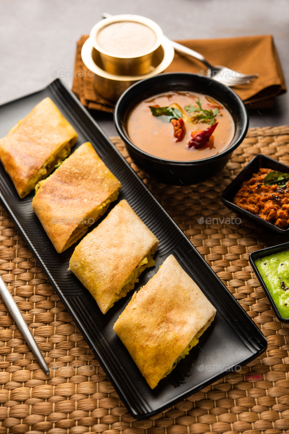 Cut Masala dosa or spring dosa is a South Indian meal served with ...