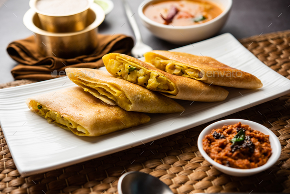 Cut Masala dosa or spring dosa is a South Indian meal served with ...