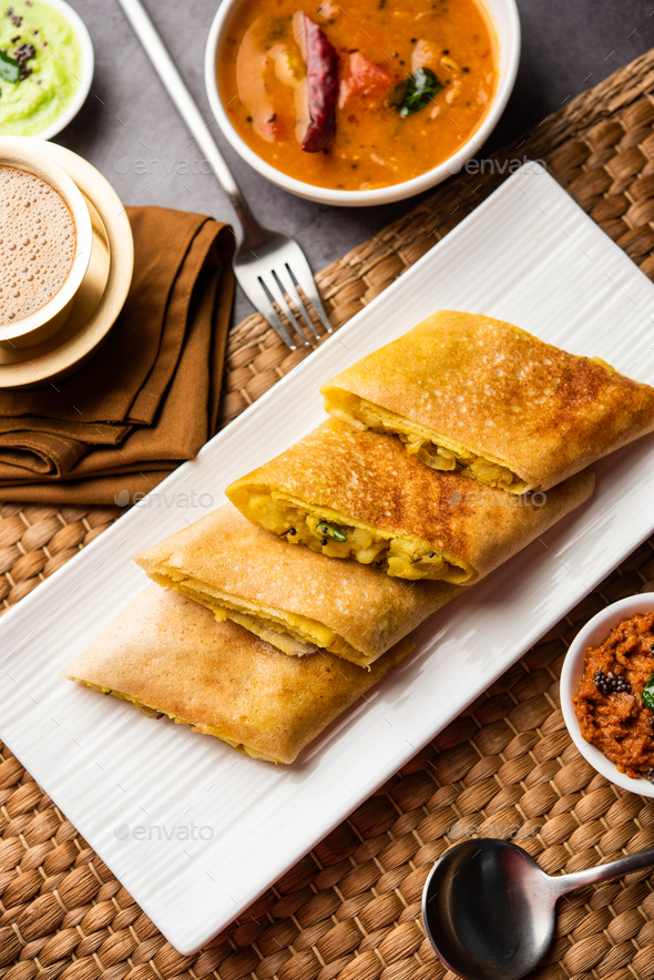 Cut Masala dosa or spring dosa is a South Indian meal served with ...