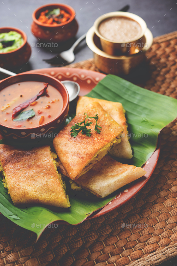 Cut Masala dosa or spring dosa is a South Indian meal served with ...