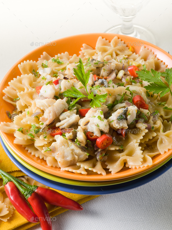 pasta with hake, hot chili pepper and parsley Stock Photo by MarcoMayer