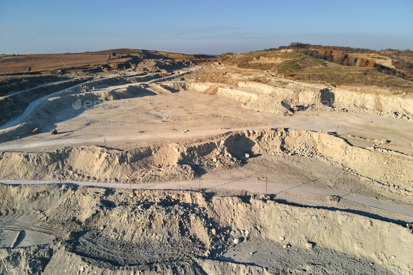 Aerial view of open pit mining site of limestone materials for ...