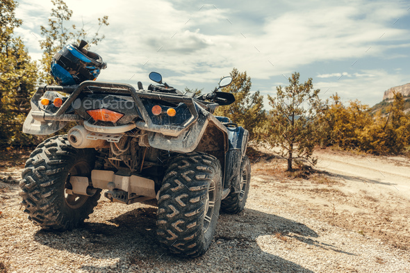 Close-up tail view of ATV quad bike. Stock Photo by FabrikaPhoto ...