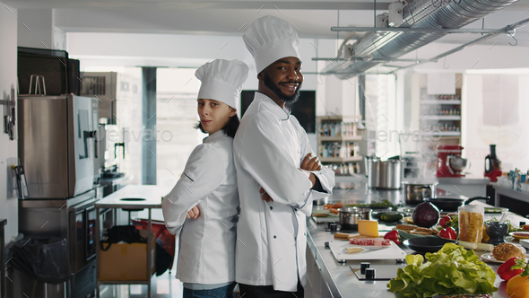 Portrait of chefs doing teamwork to cook food recipe Stock Photo by DC ...