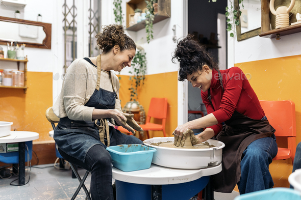 Women in Pottery Class Stock Photo by nunezimage | PhotoDune