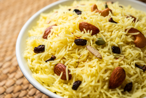 Kashmiri sweet modur pulao made of rice cooked with sugar, water ...