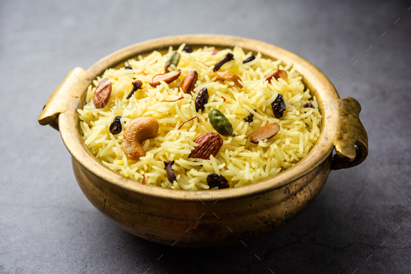 Kashmiri sweet modur pulao made of rice cooked with sugar, water ...