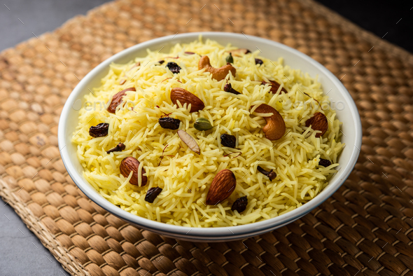 Kashmiri sweet modur pulao made of rice cooked with sugar, water ...