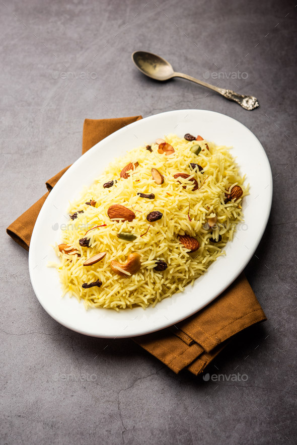 Kashmiri sweet modur pulao made of rice cooked with sugar, water ...