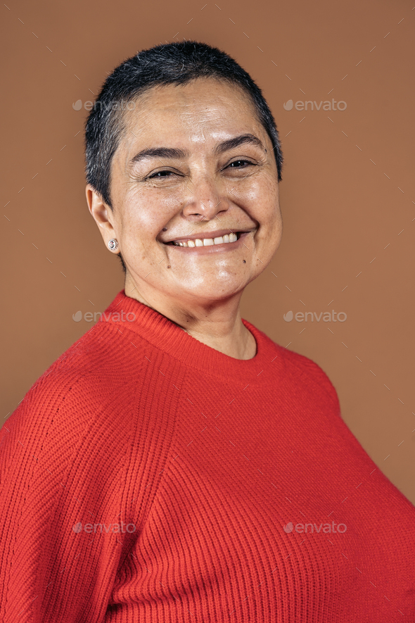 Happy Boomer Woman in Studio Shot Stock Photo by nunezimage | PhotoDune
