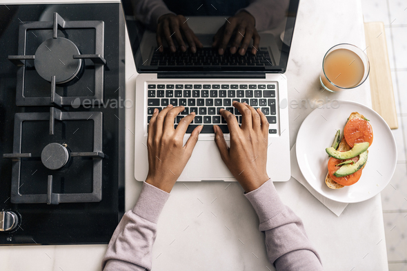 Using Laptop Top View Stock Photo by nunezimage | PhotoDune