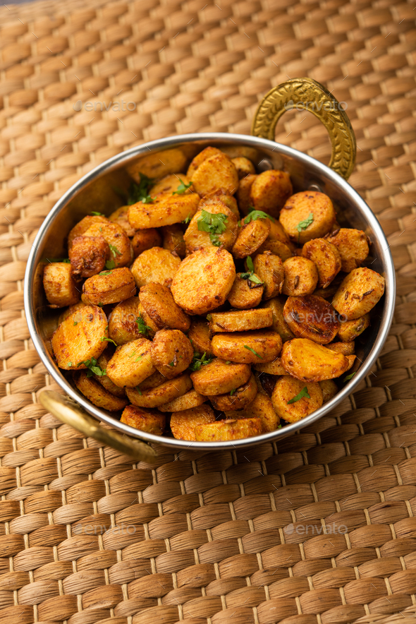 Stir fried taro roots. Arbi ki sabji, ghuiya masala curry Sabzi or arvi ...