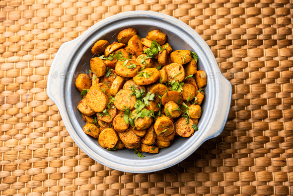 Stir fried taro roots. Arbi ki sabji, ghuiya masala curry Sabzi or arvi ...