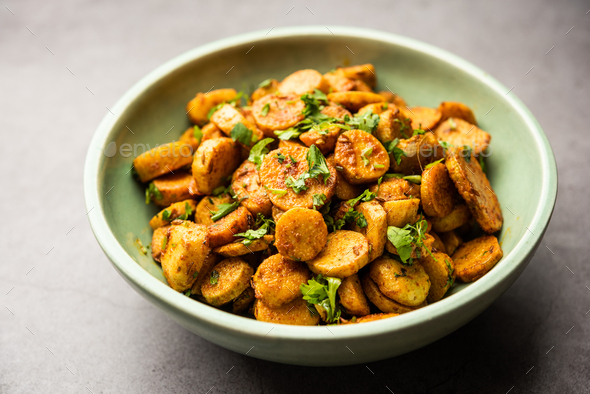 Stir fried taro roots. Arbi ki sabji, ghuiya masala curry Sabzi or arvi ...