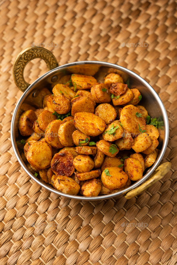 Stir fried taro roots. Arbi ki sabji, ghuiya masala curry Sabzi or arvi ...